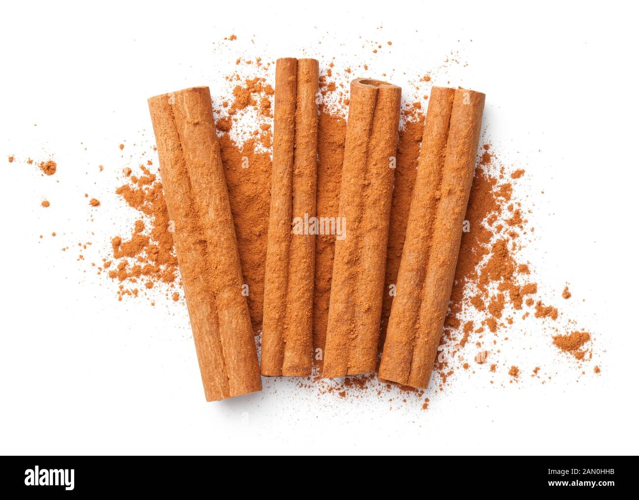 Cinnamon sticks and powder isolated on white background. Flat lay. Top ...