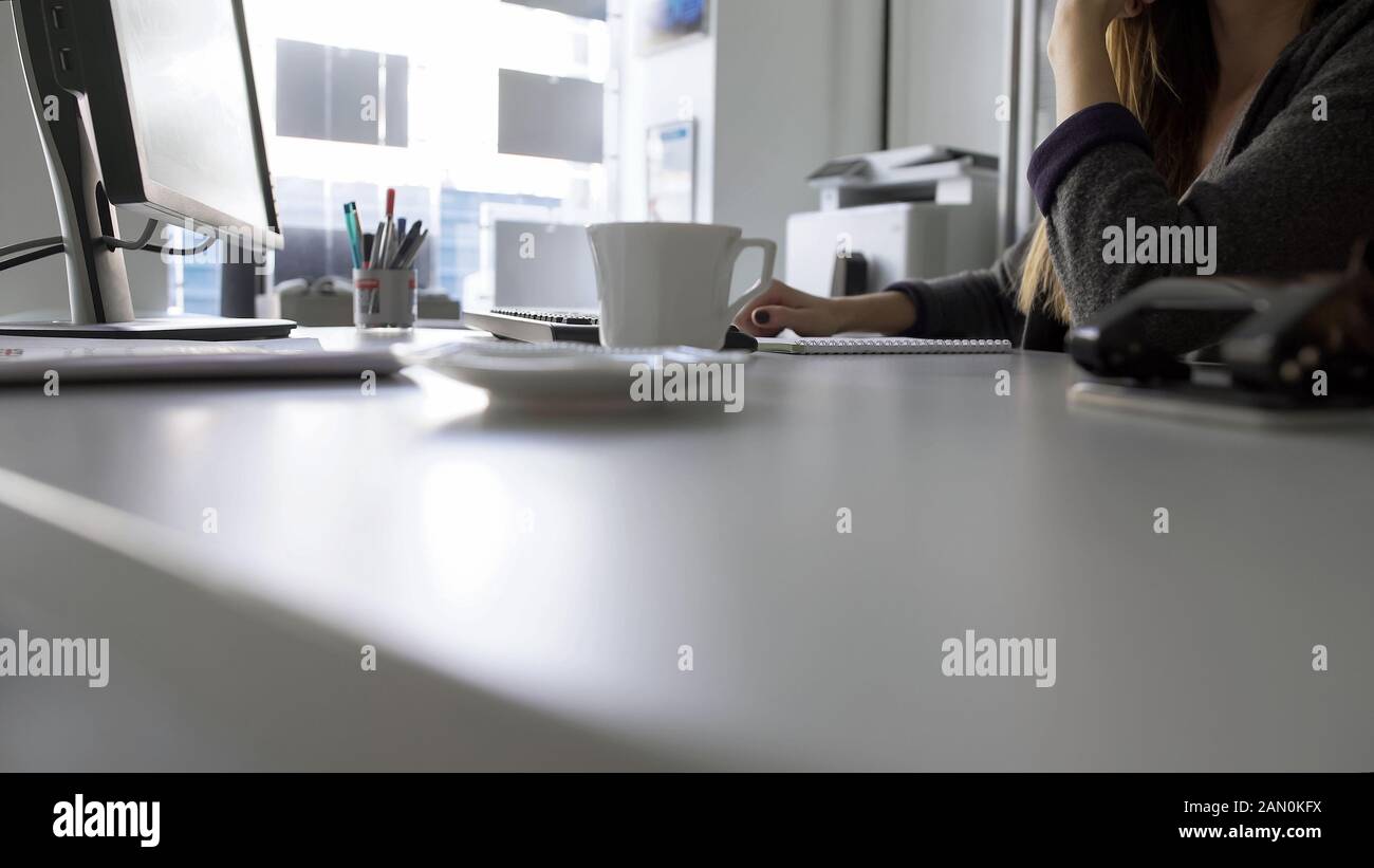 Concentrated female journalist thinking article hi-res stock ...