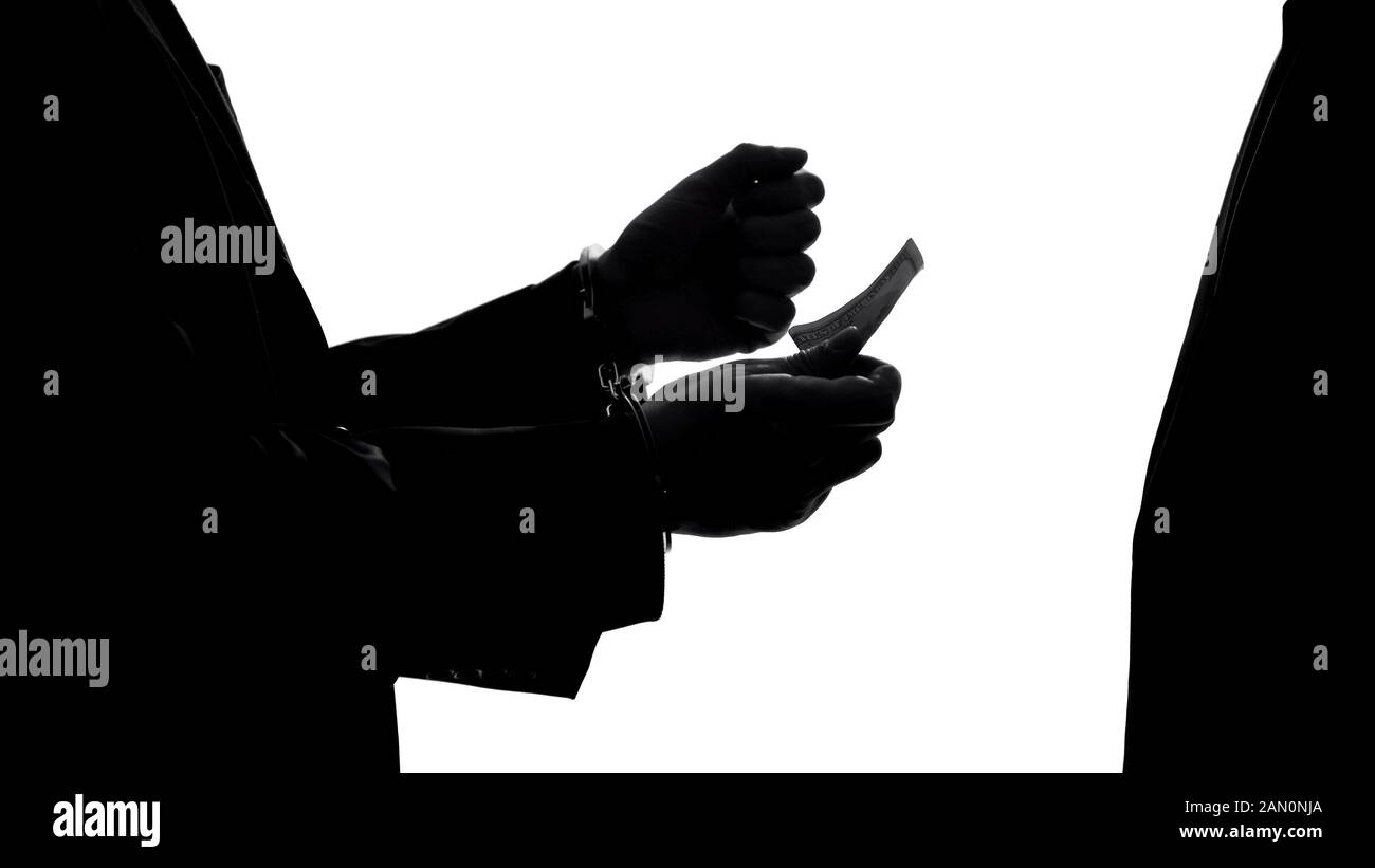 Man in jail silhouette hi-res stock photography and images - Alamy