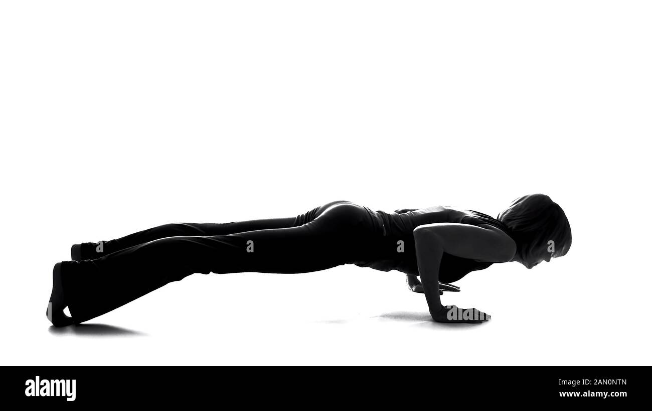 Sport female shadow practicing plank exercise, body strength, pilates ...