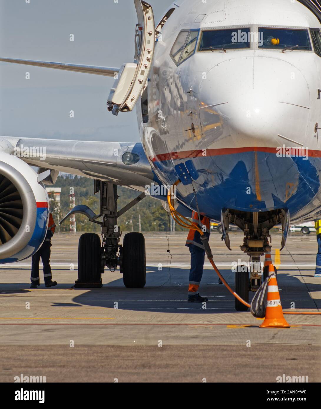Commercial Airplane check getting ready for flight Stock Photo - Alamy