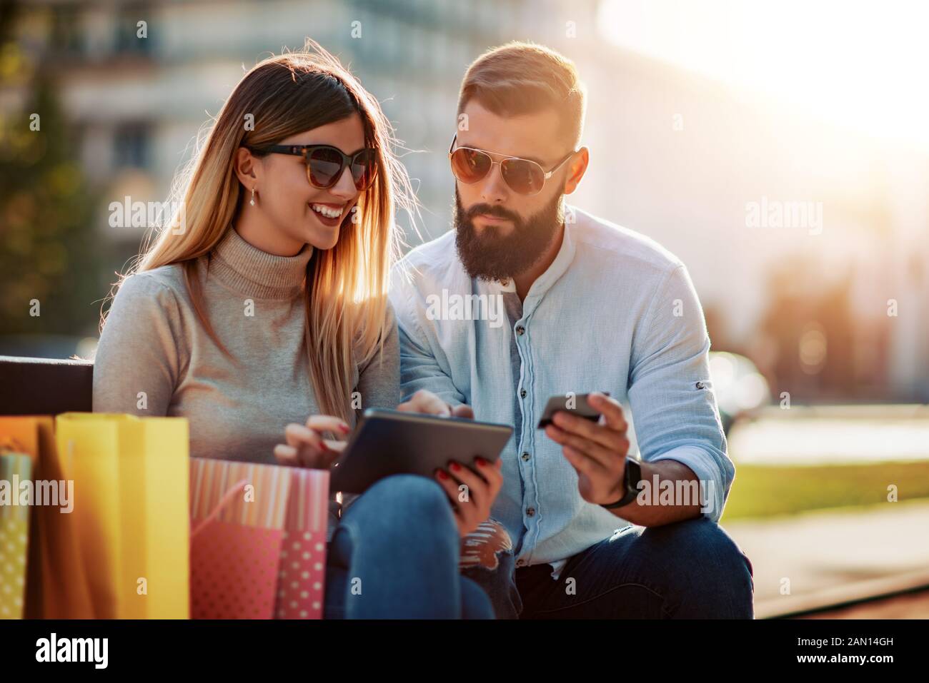 Happy couple using digital tablet together.People,love,technology and ...