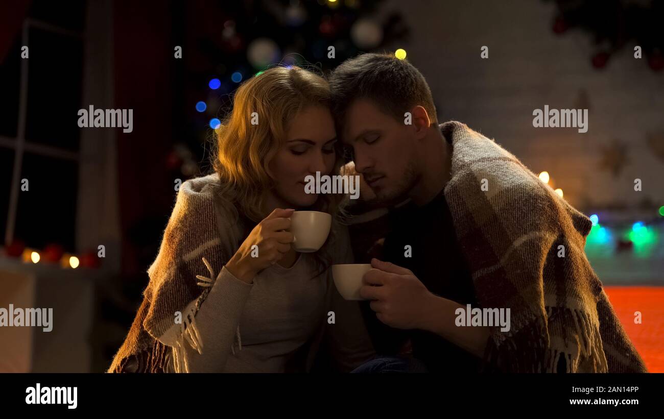 Sweet Husband And Wife Drinking Hot Cocoa Under Cozy Plaid Romance At