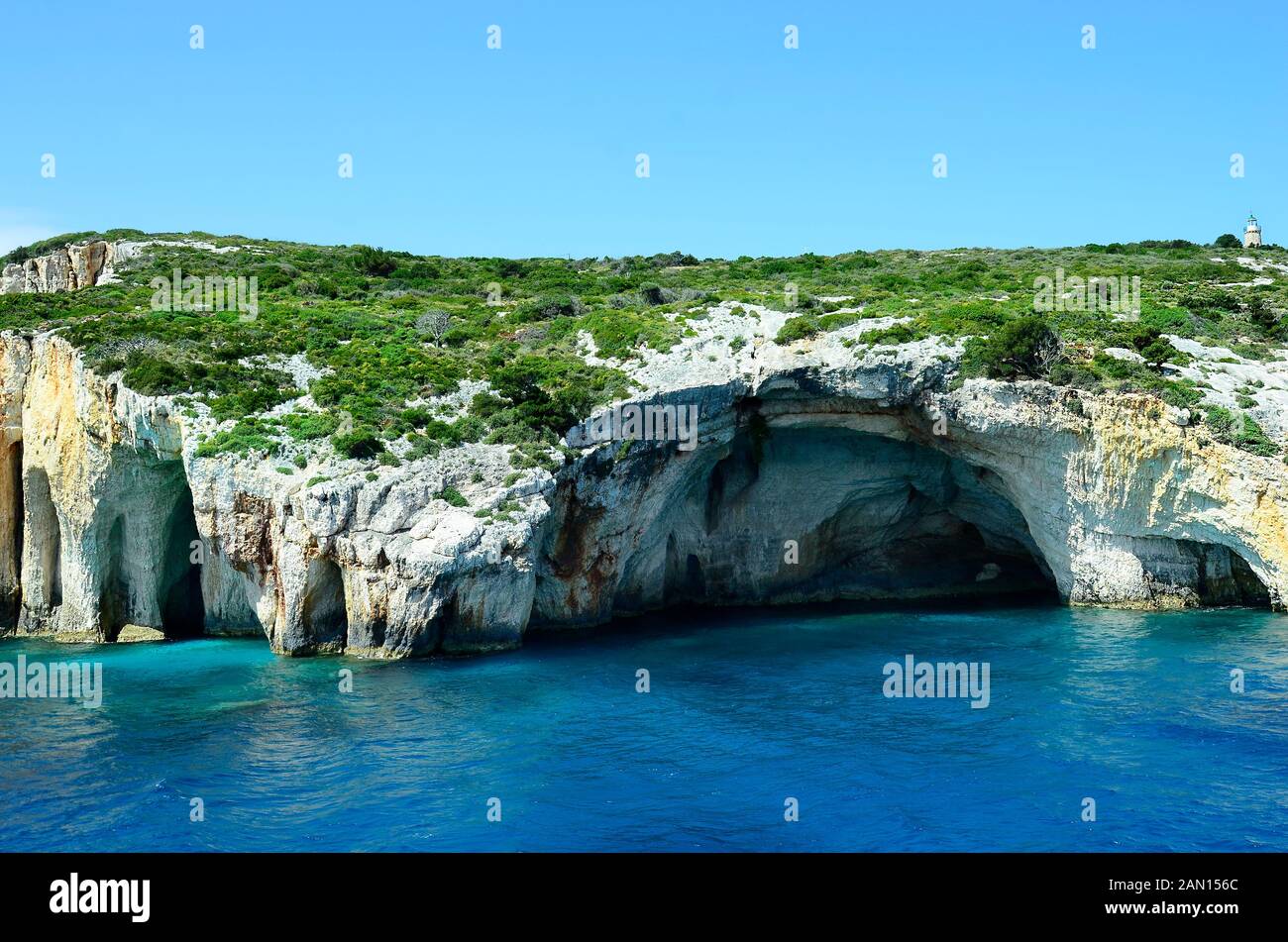 Greece, Zakynthos Island, rocky coast and lighthouse on cape Skinari ...