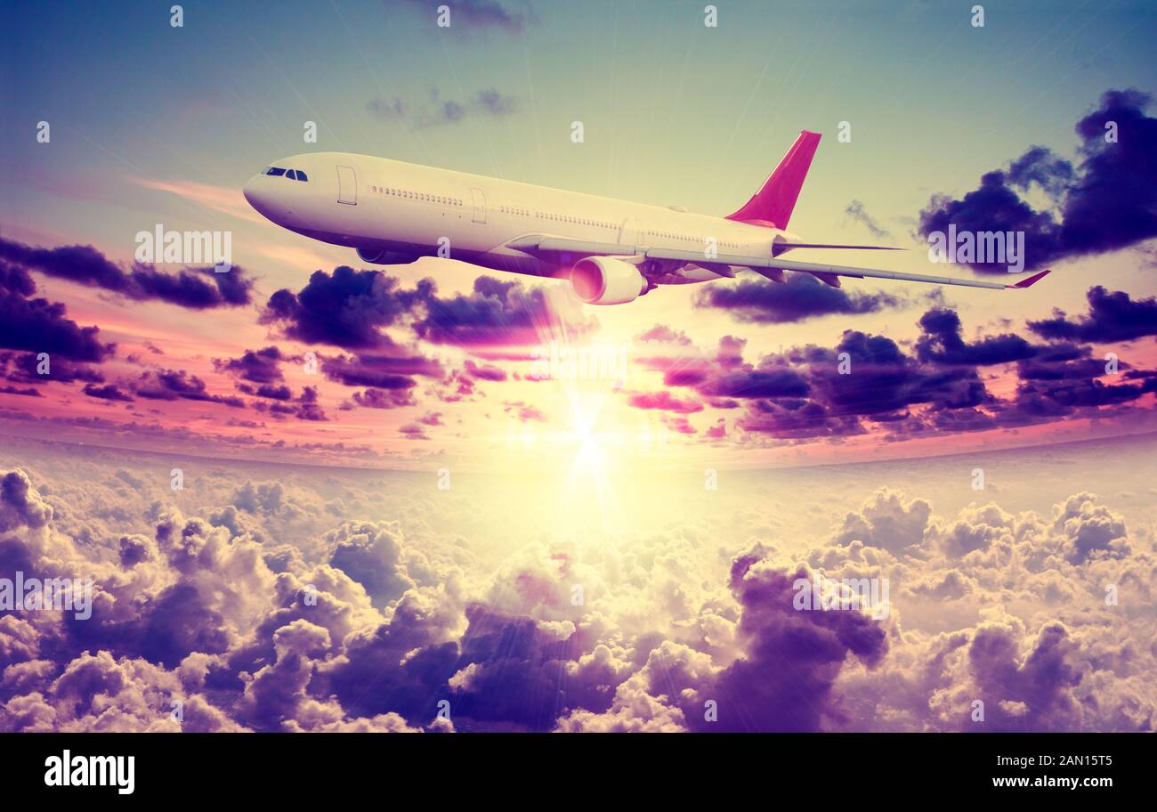 Concept of airplane travel. Flying above the city. Scenery sunset ...