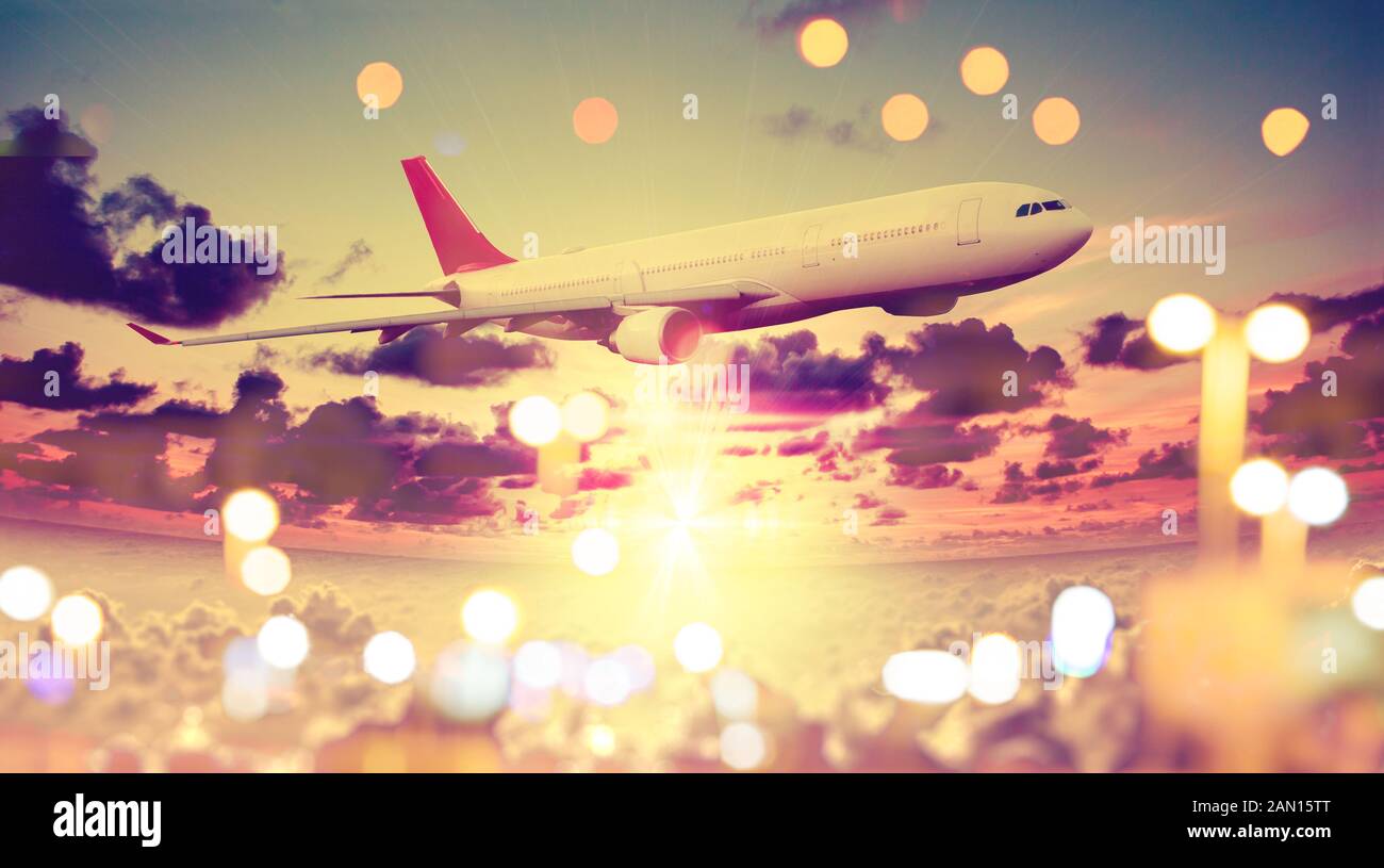 Concept of airplane travel. Flying above the city. Scenery sunset ...