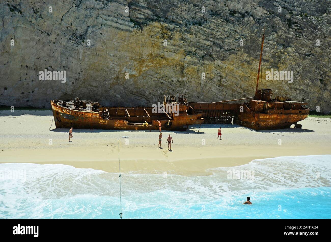 Zakynthos, Greece - May 25th 2016: Unidentified people and wreck of ...