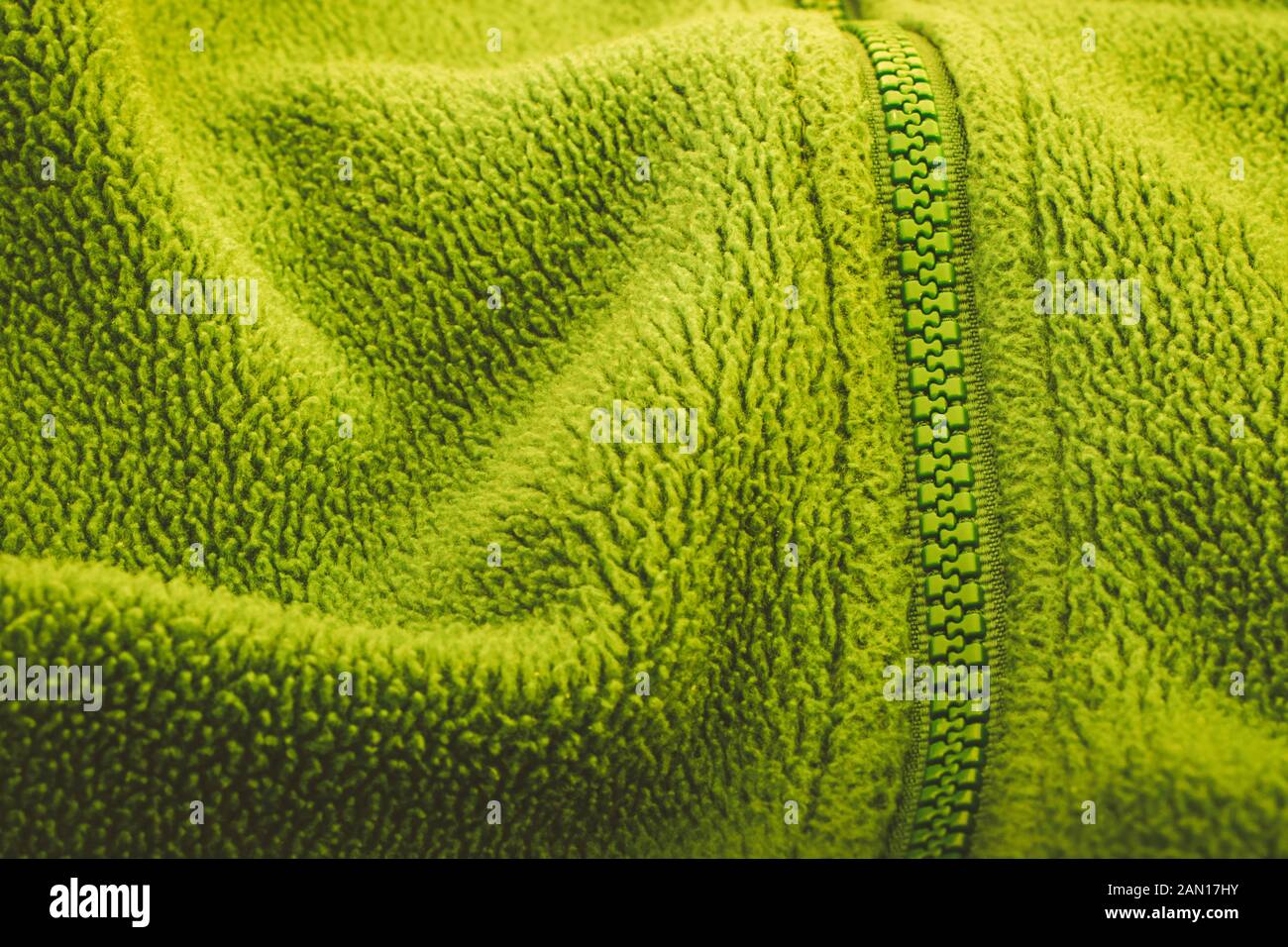 Close up shot of a YKK plastic zip fastener / zipper on fleece jacket ...