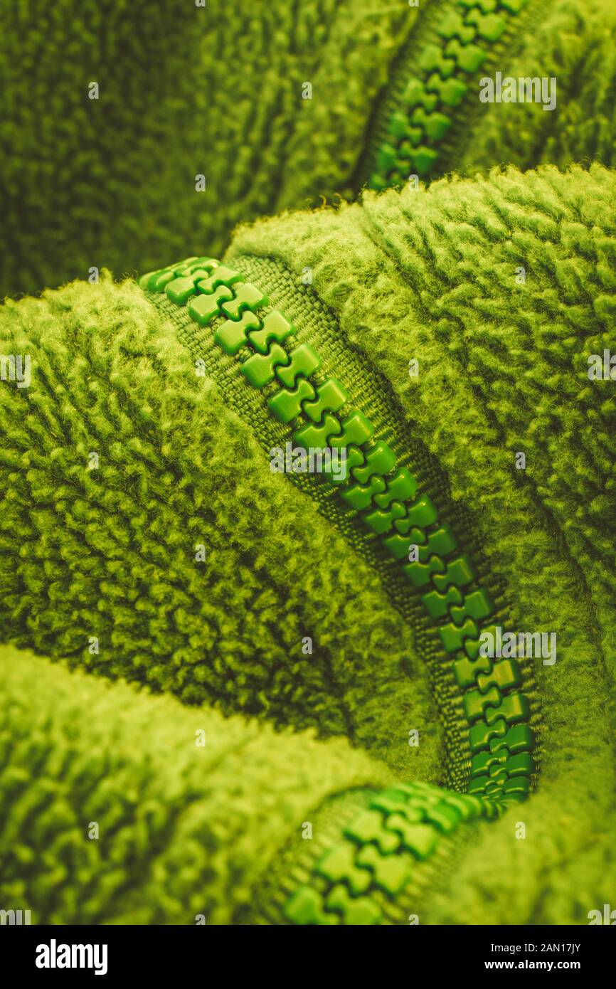 Close up shot of a YKK plastic zip fastener / zipper on fleece jacket ...