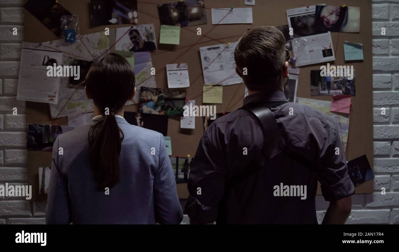 Secret agency teammates searching for criminal movements on ...