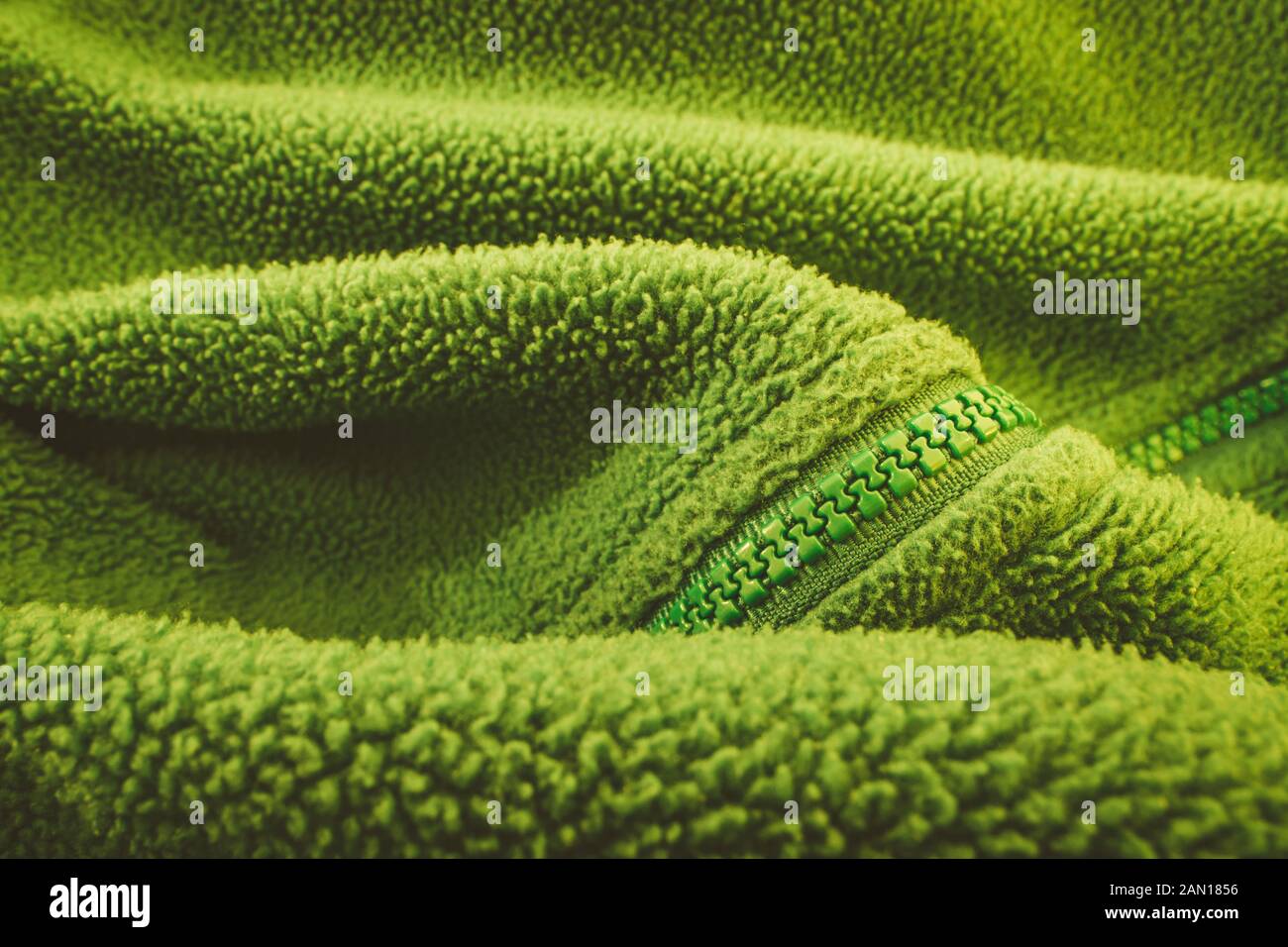Close up shot of a YKK plastic zip fastener / zipper on fleece jacket ...