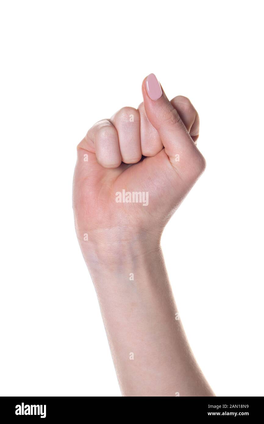 Female hand with fingers folded into fist isolated on white background ...