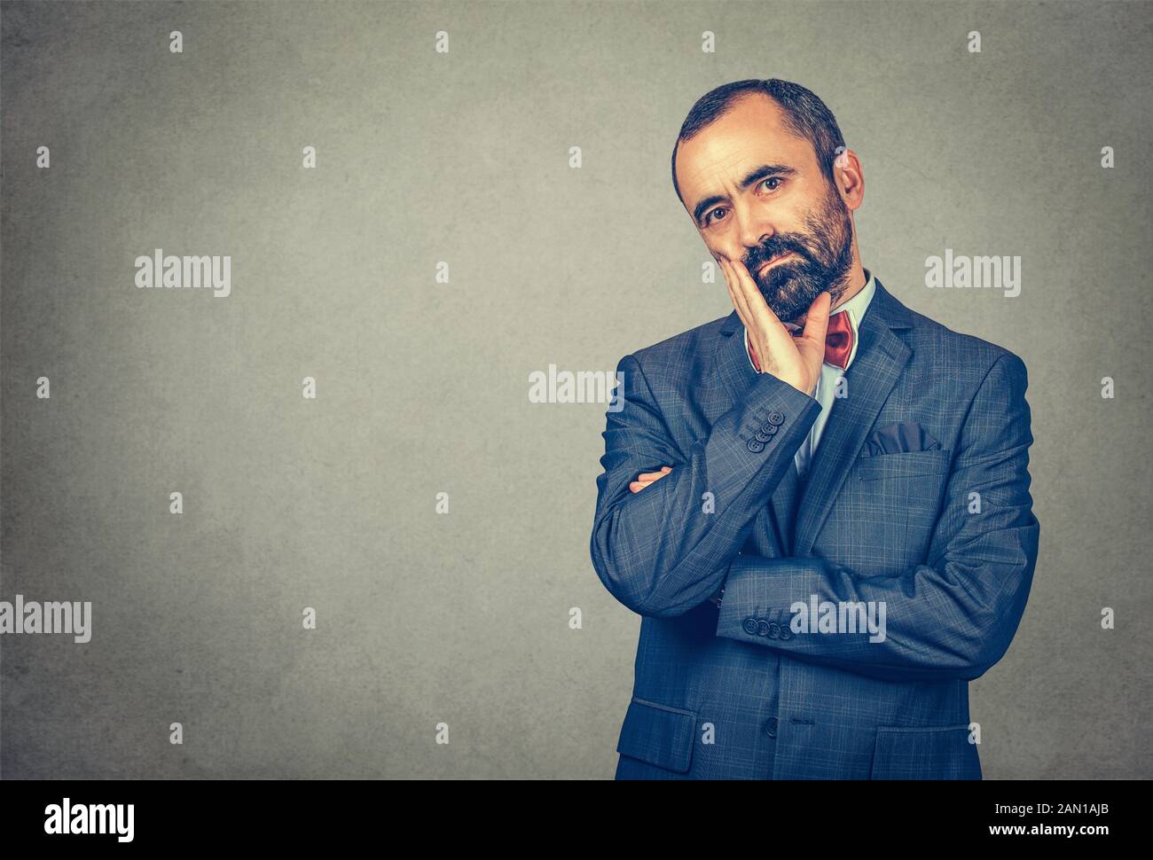 Portrait man thinking looking at you camera pensive thoughtful isolated ...