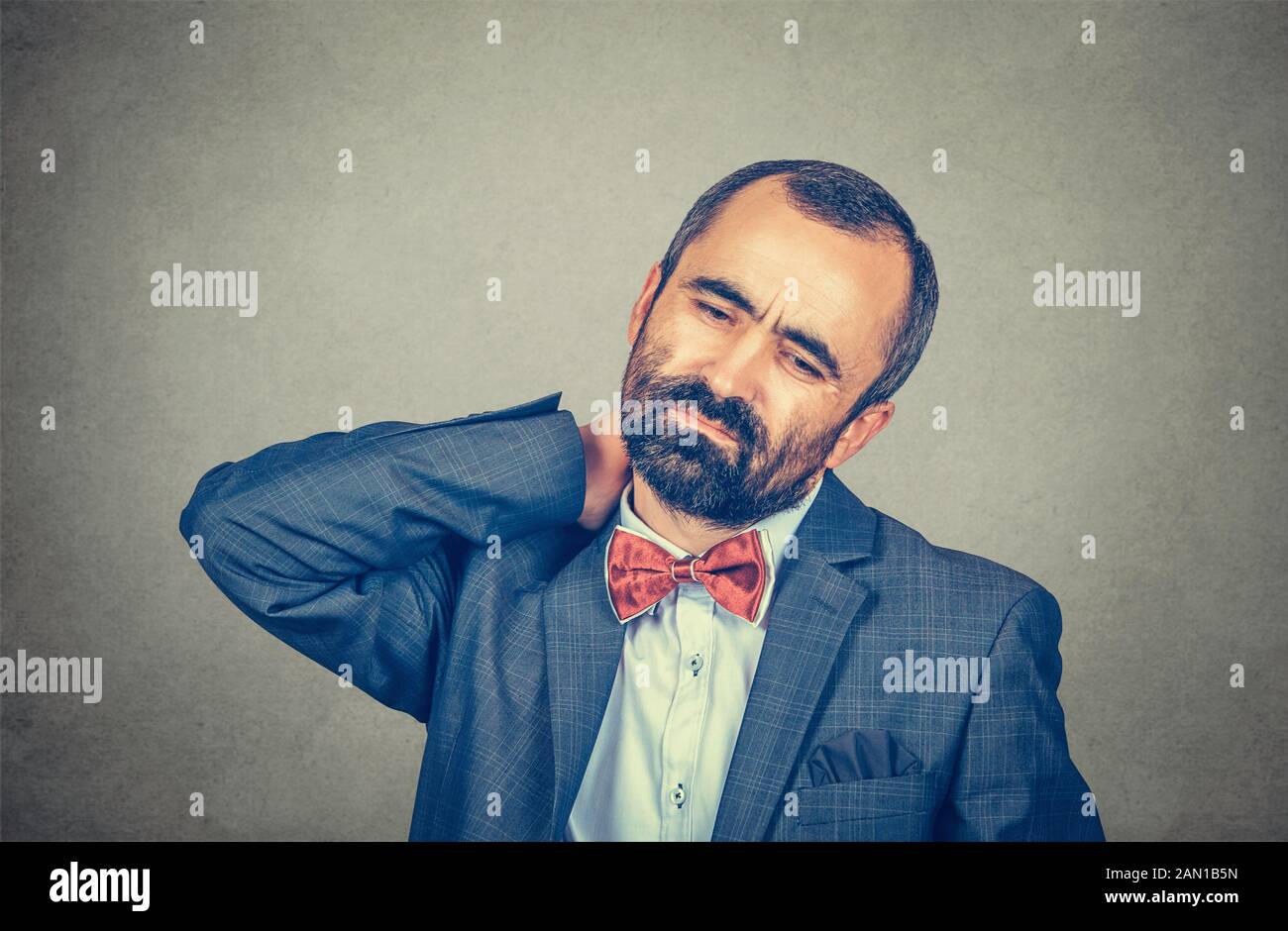 Close up portrait tired middle aged businessman executive with neck ...