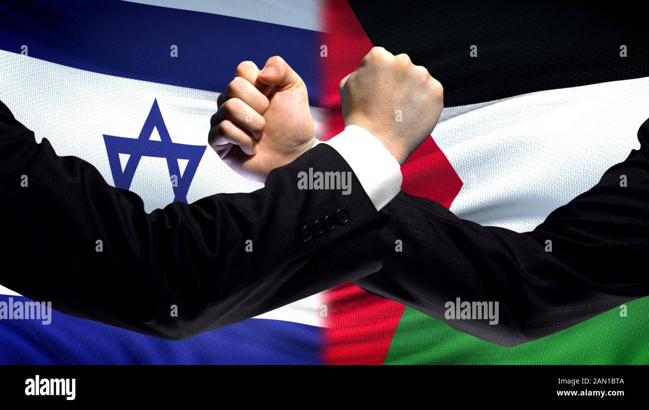 Israel vs Palestine confrontation, religious conflict, fists on flag ...