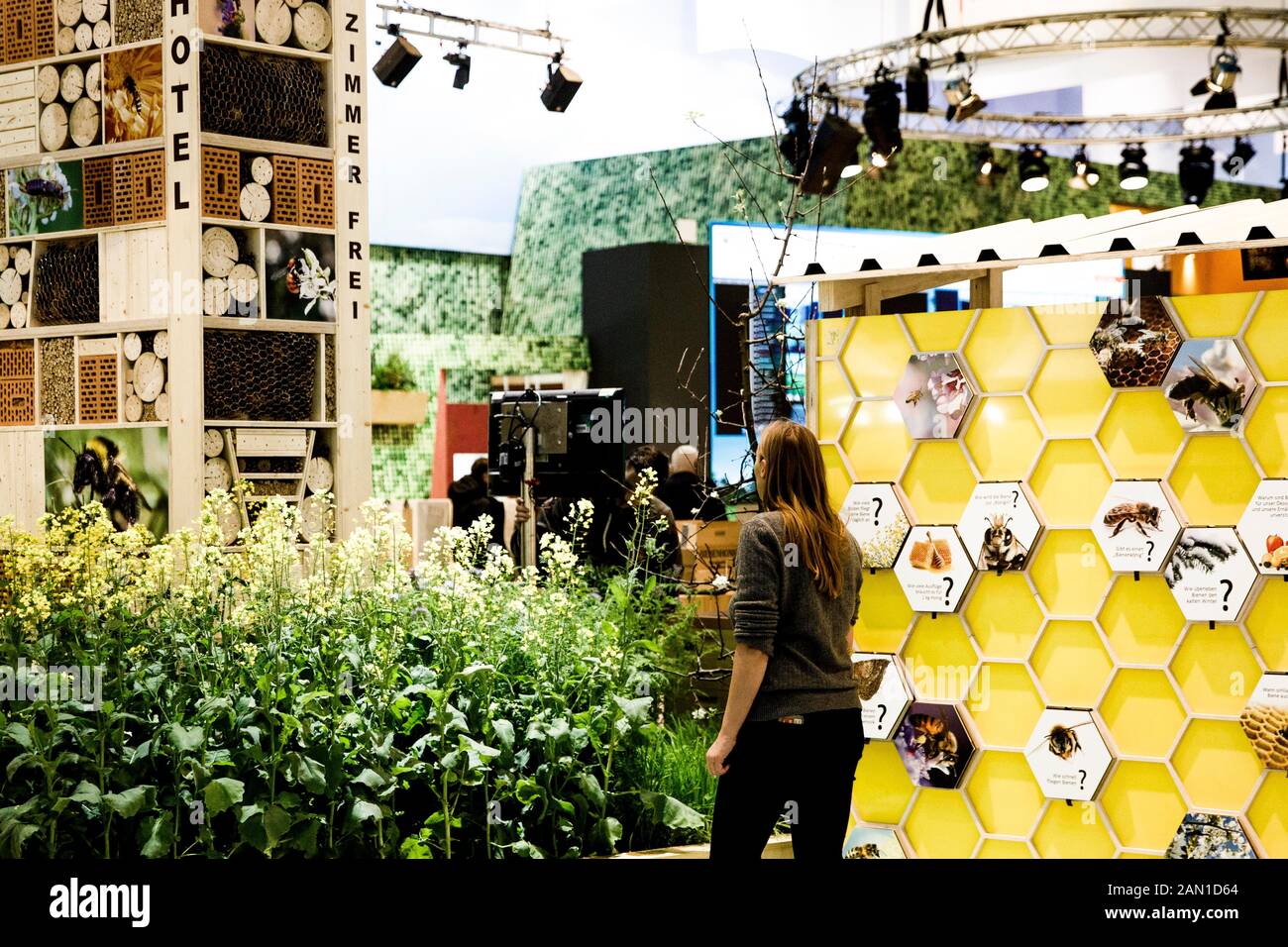 Berlin, Germany. 15th Jan, 2020. A woman is standing in front of an ...