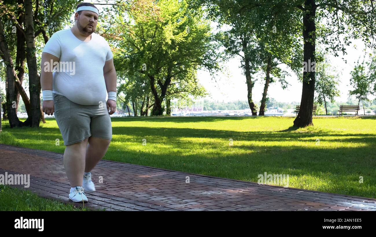 Fat man exhausted exercising hi-res stock photography and images - Alamy