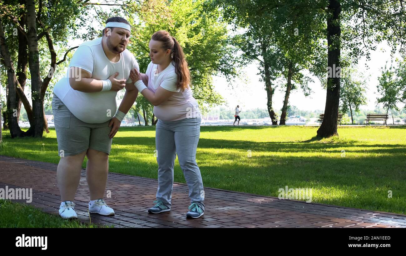 Fat obese man running heart hi-res stock photography and images - Alamy