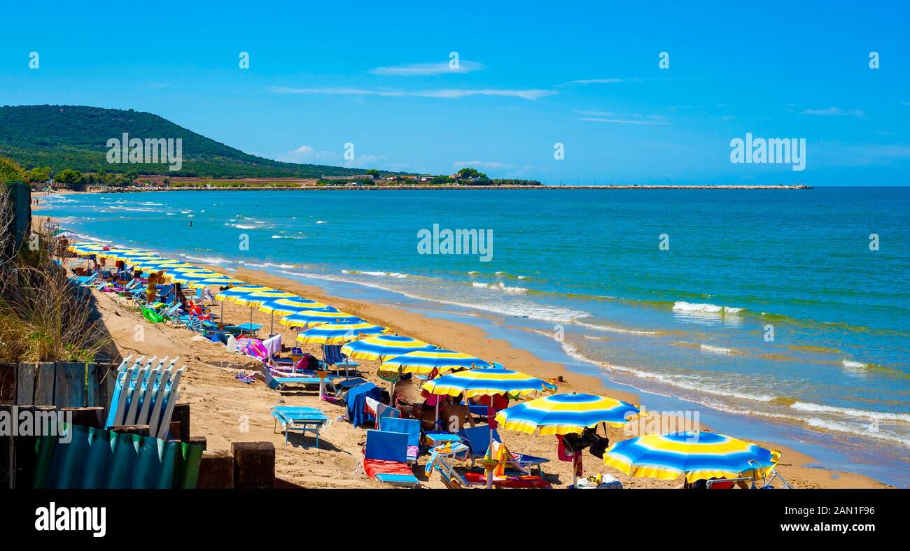 Paradisiac view of a sandy beach in Gargano. Visibles tourists Stock ...