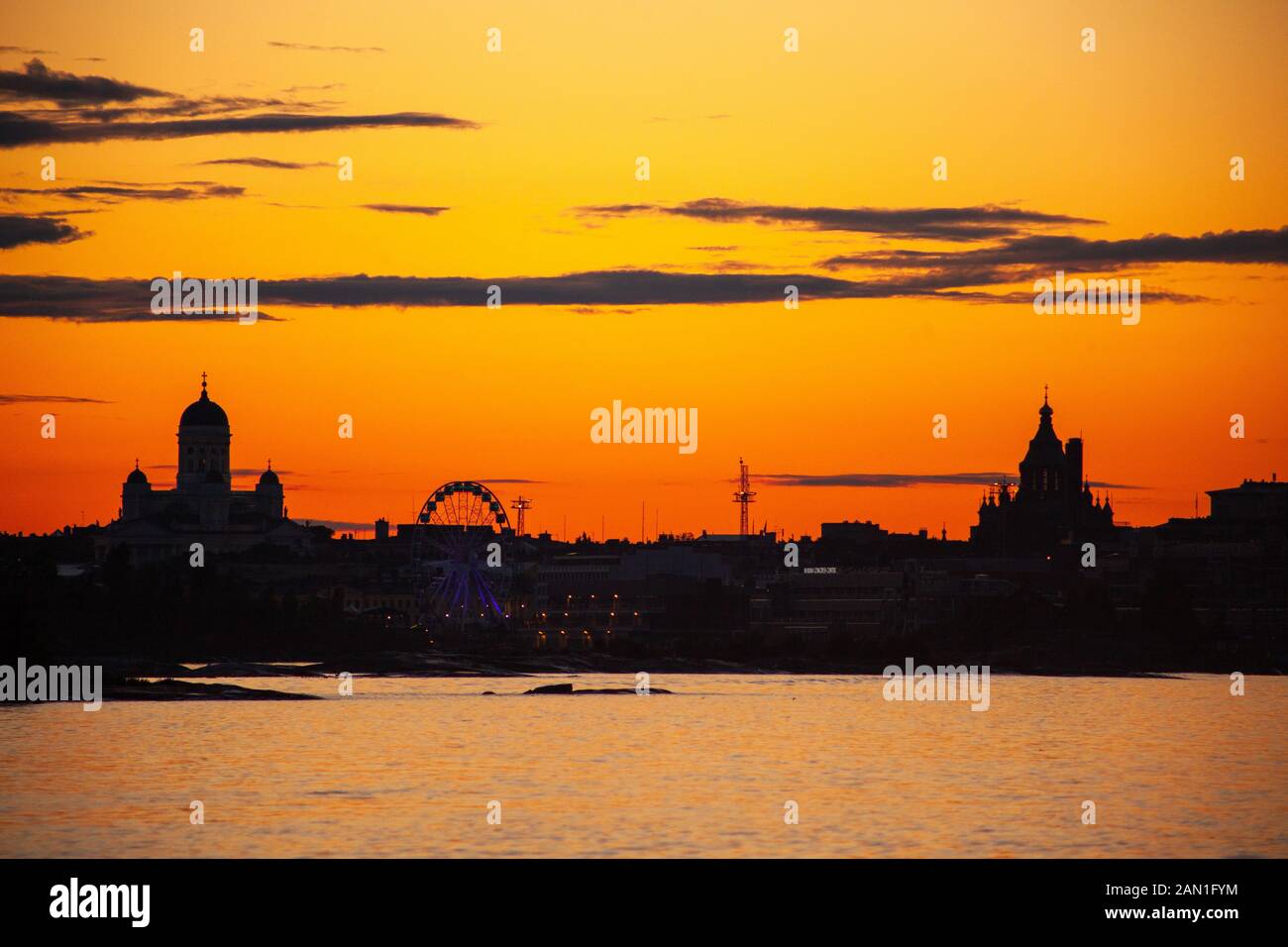 Silhouette sunset cathedral helsinki finland hi-res stock photography ...