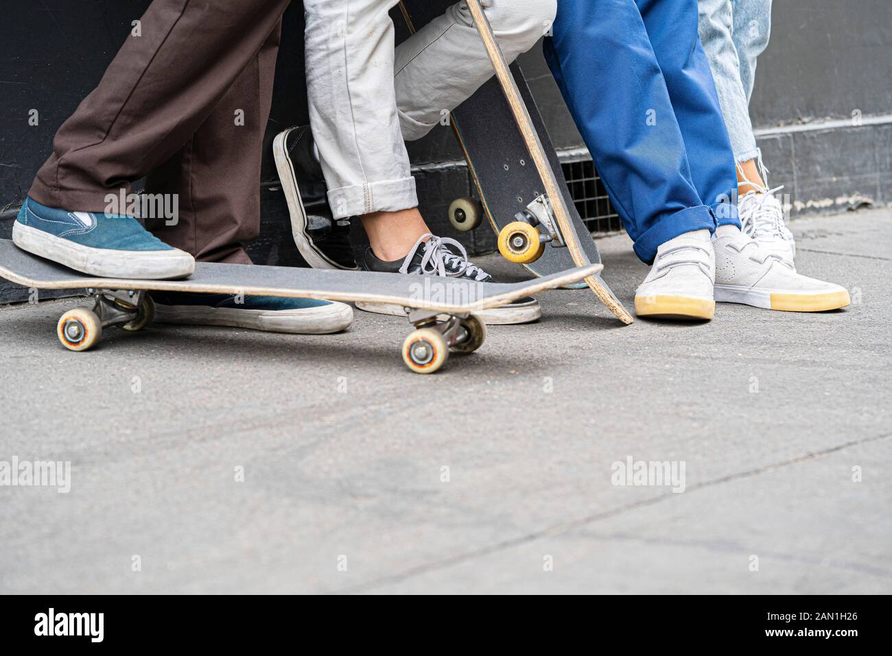 Friends with skateboards Stock Photo - Alamy
