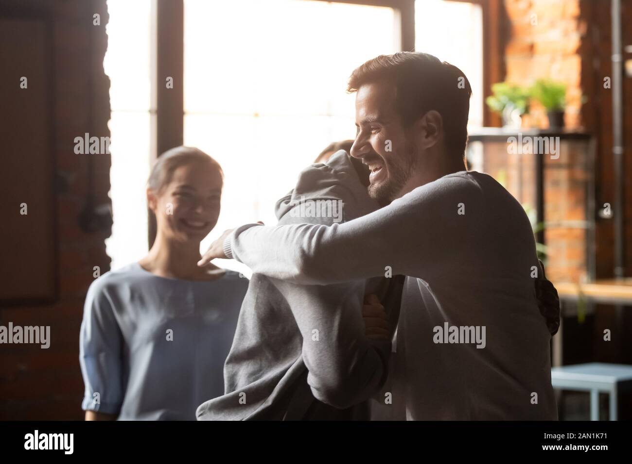 Diverse friends greeting hi-res stock photography and images - Alamy