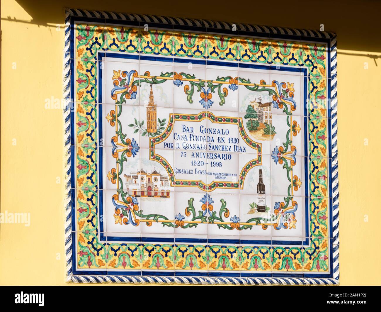 A colourful and ornate Azulejos ceramic sign marking the 75th ...