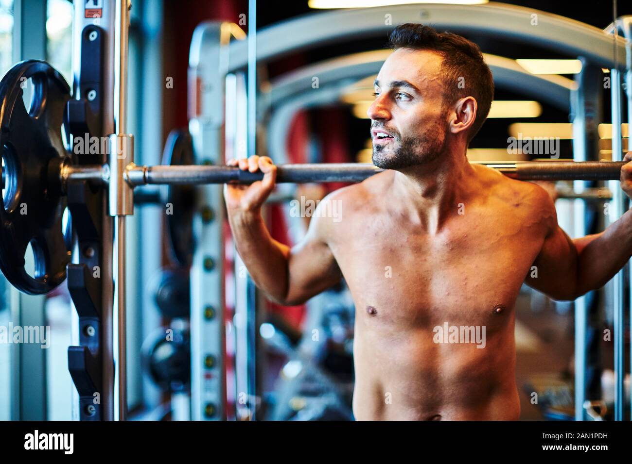 A man working out at the gym Stock Photo - Alamy