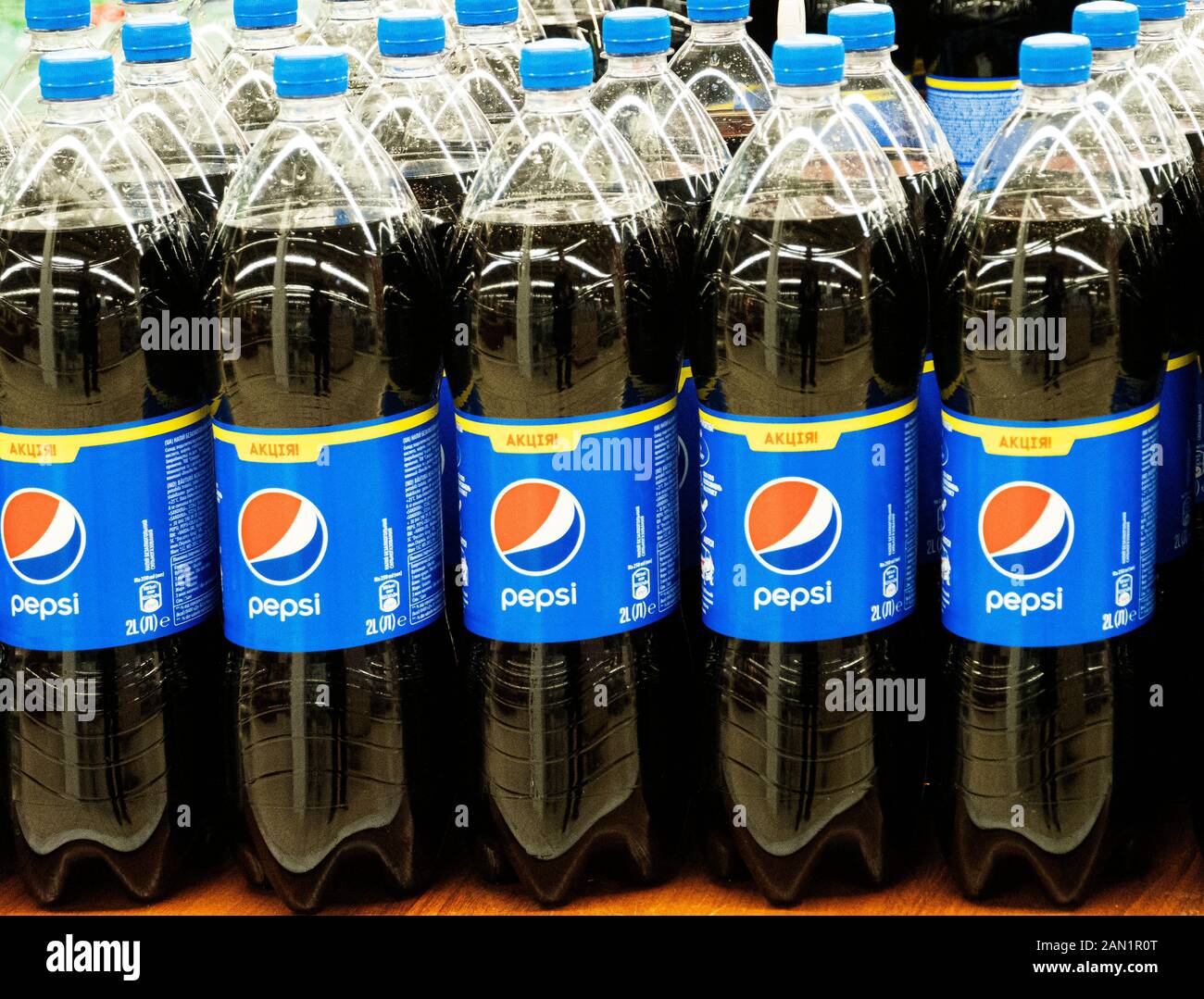 Pepsi in 2l bottles seen in a store shelf Stock Photo - Alamy
