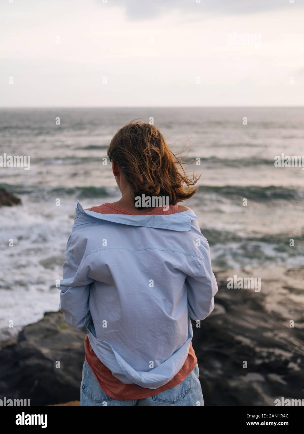 Woman looking ocean hi-res stock photography and images - Alamy