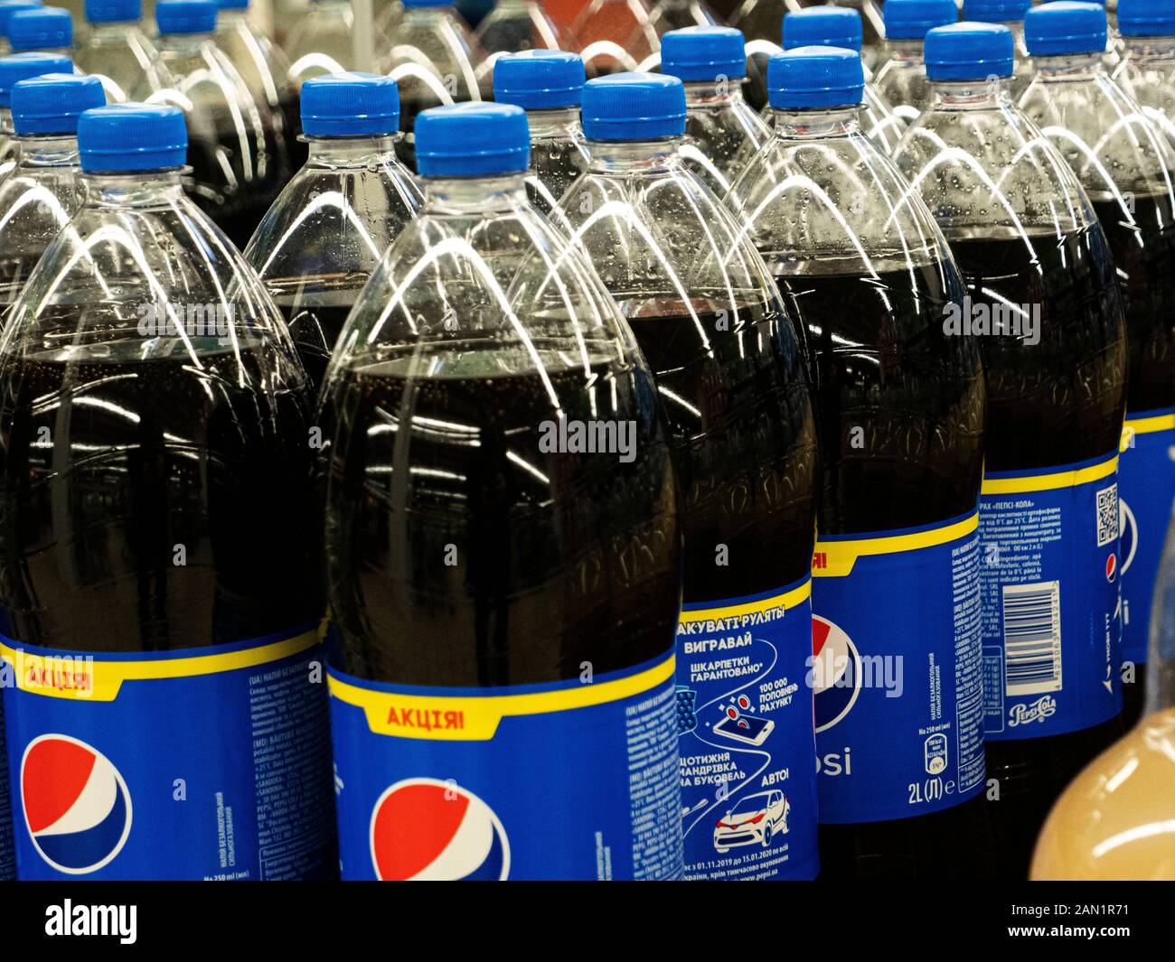 Pepsi in 2l bottles seen in a store shelf Stock Photo - Alamy