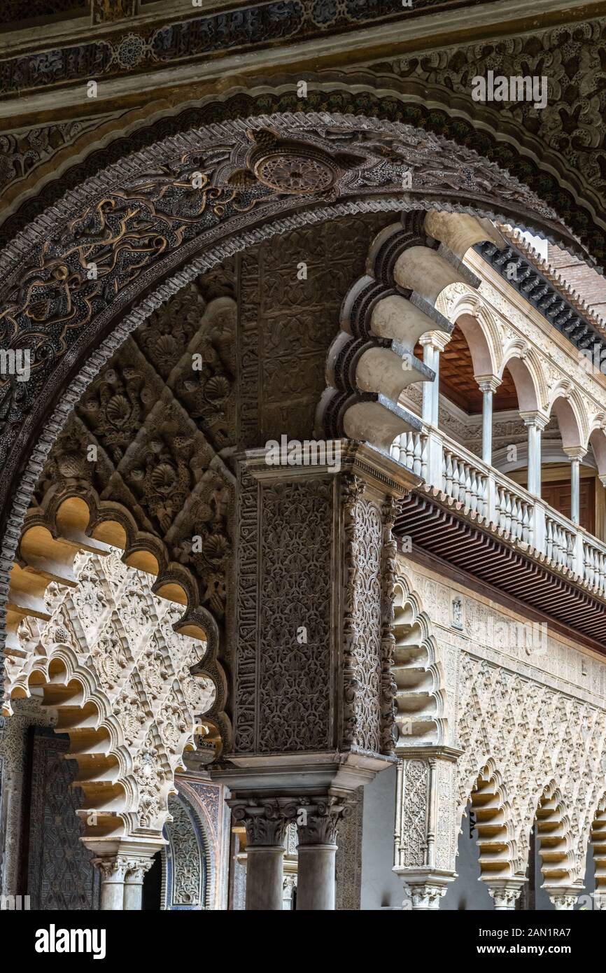 The elaborate multifoil arches and ornate stuccowork pillars of the ...
