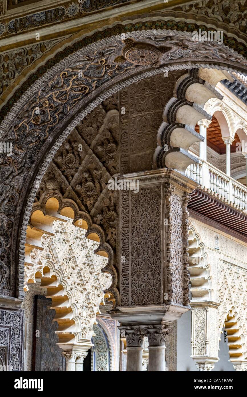 The elaborate multifoil arches and ornate stuccowork pillars of the ...