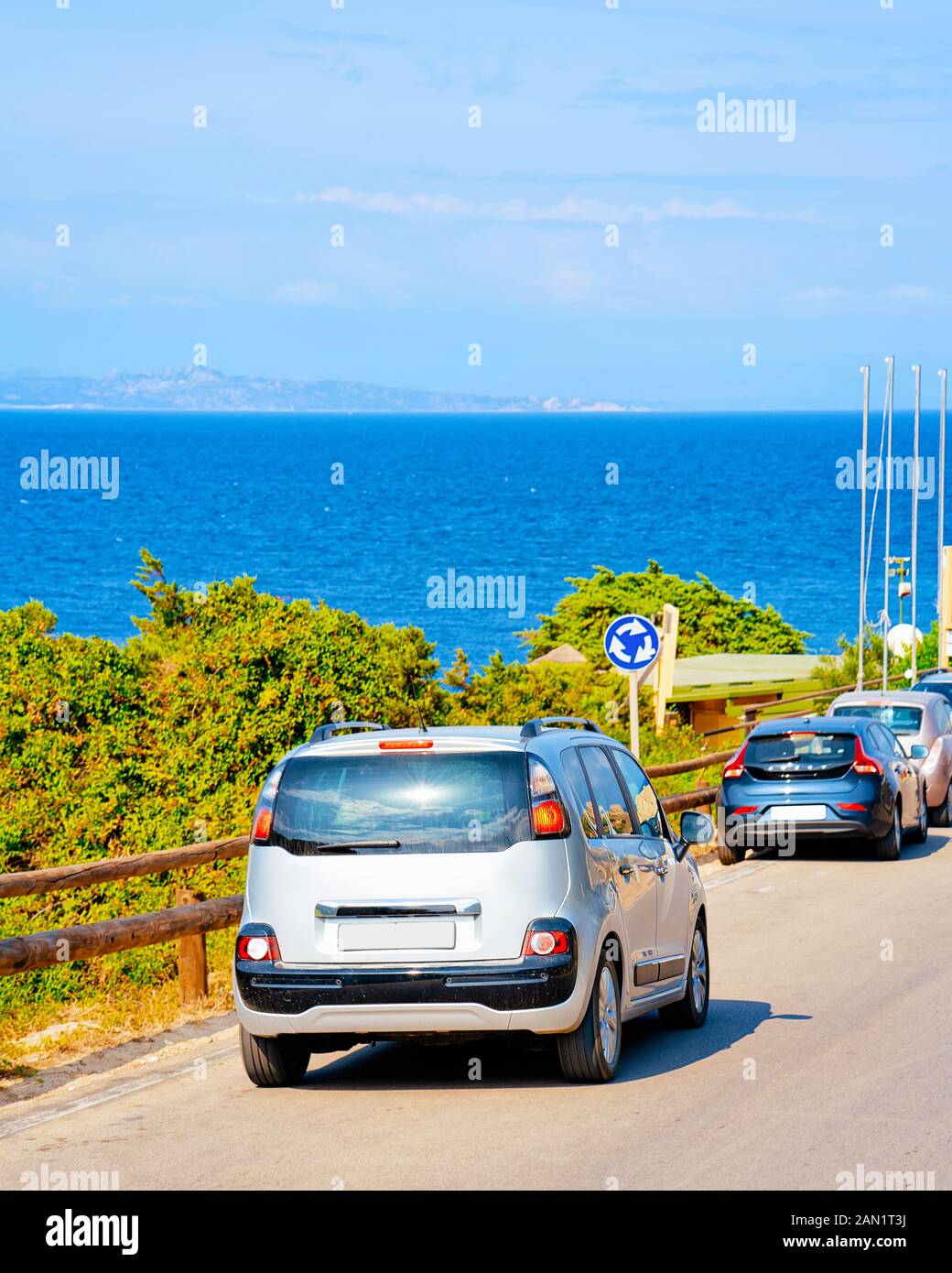 Car driving at highway road Capo Testa reflex Stock Photo - Alamy