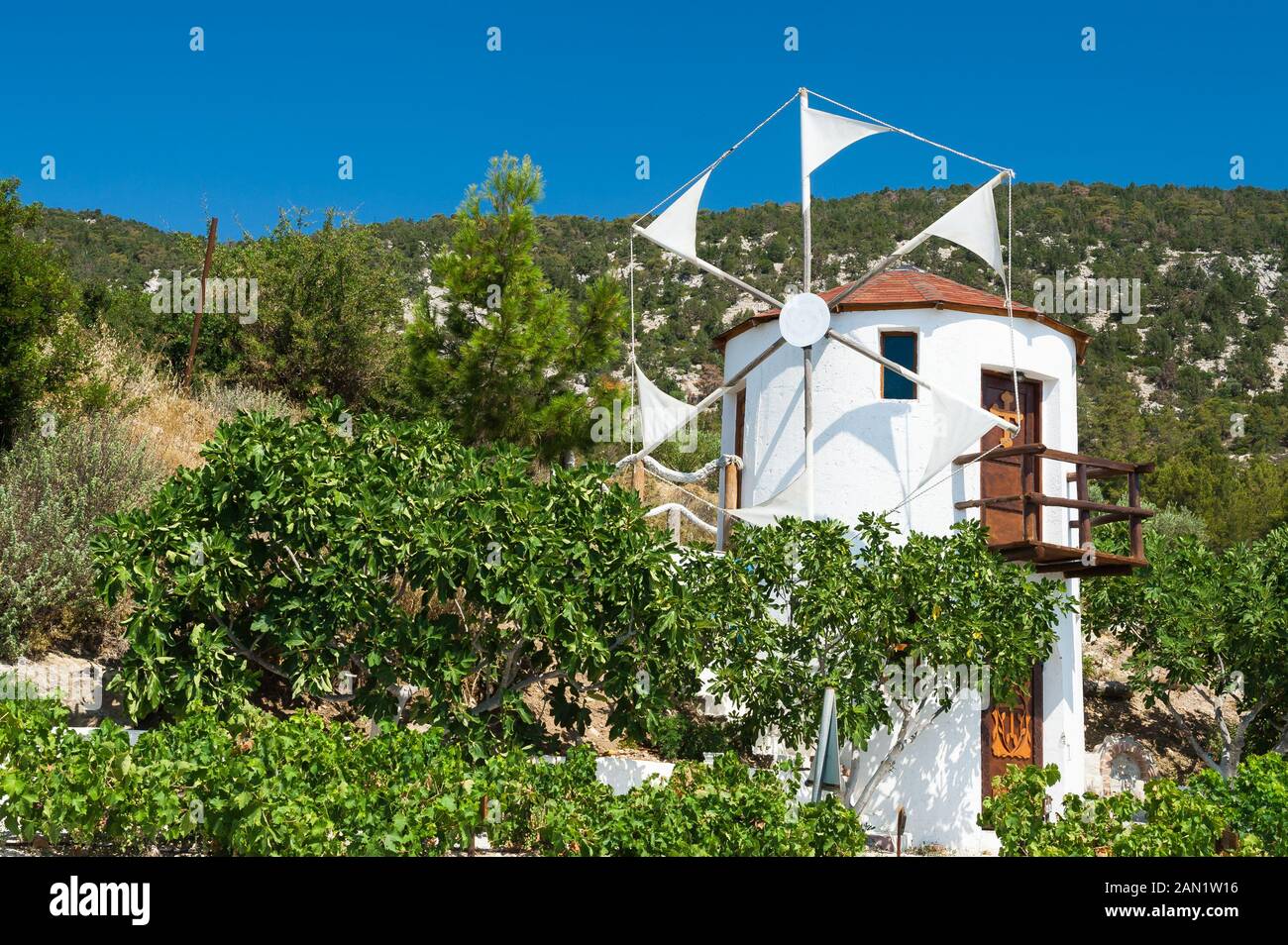 Old windmill turned into traditional greek restaurant in Monolithos ...