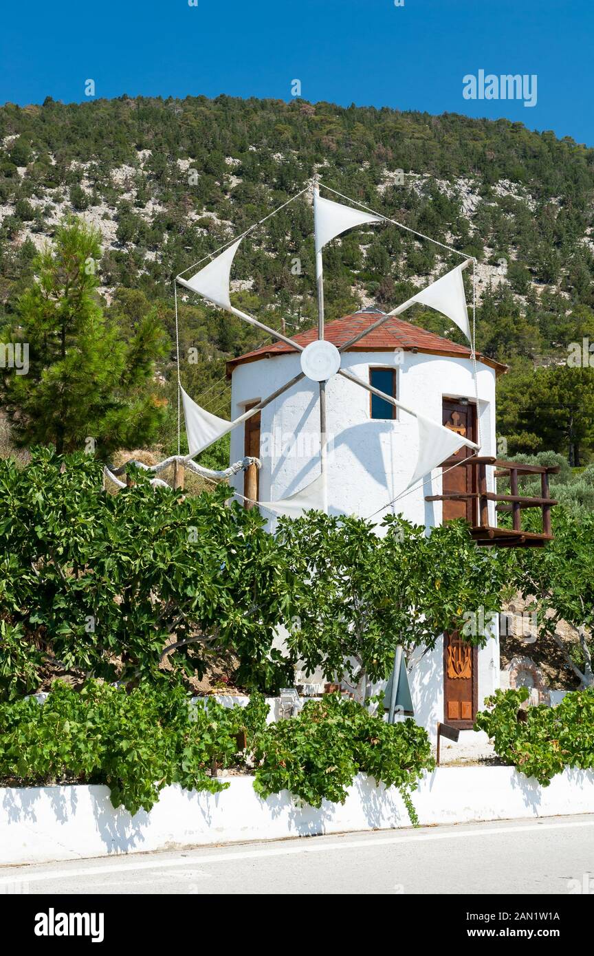 Old windmill turned into traditional greek restaurant in Monolithos ...