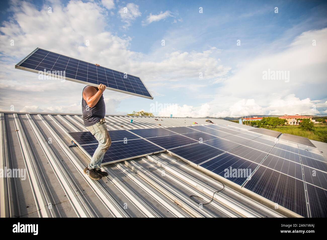Man installing solar panel hi-res stock photography and images - Alamy