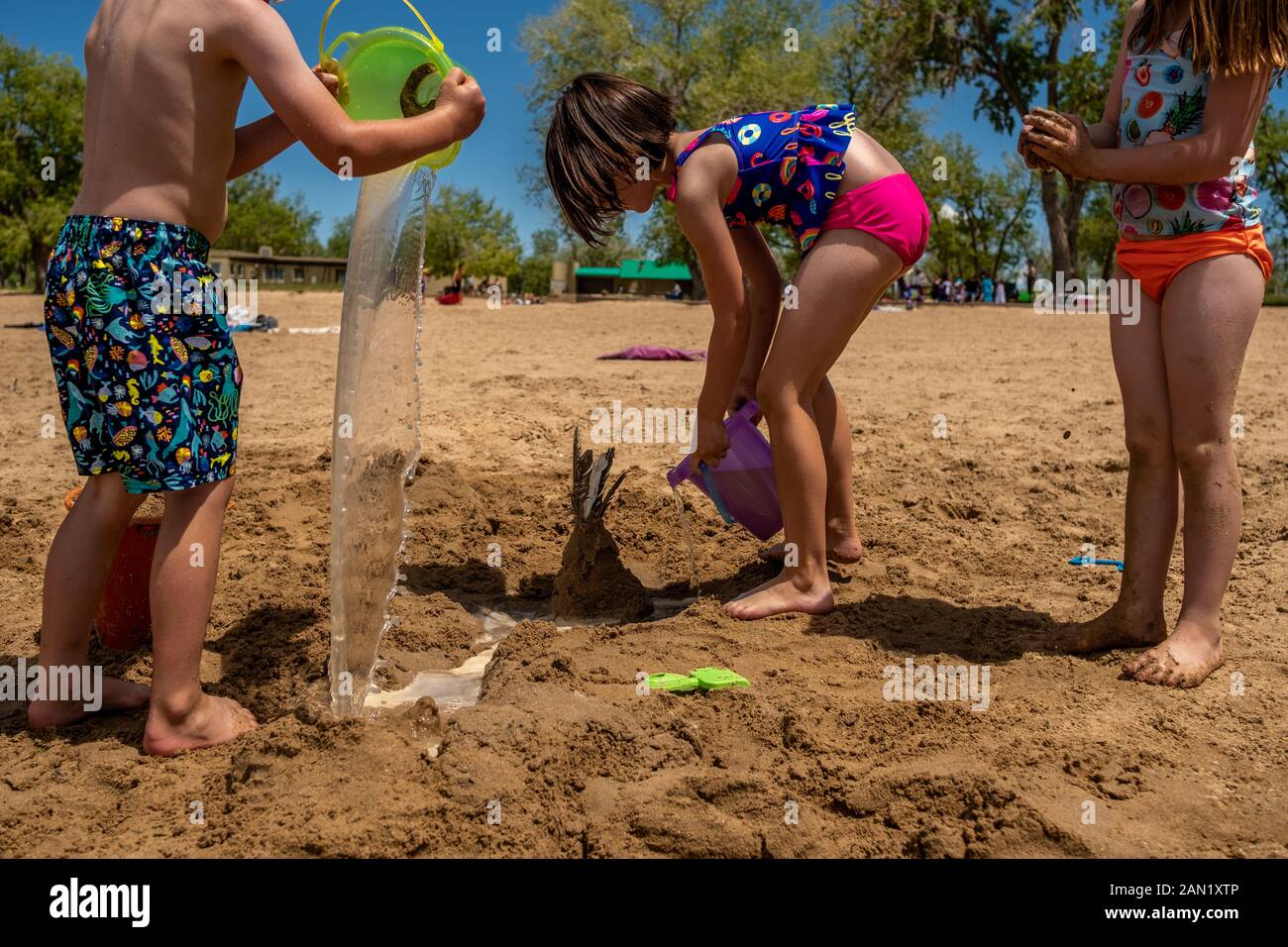 Children playing on building sand hi-res stock photography and images ...