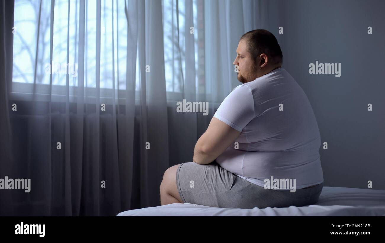Young Man Unhappy Fat Stock Photos & Young Man Unhappy Fat Stock Images ...