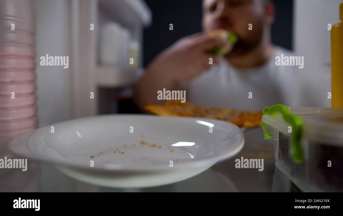Fat eating fridge hi-res stock photography and images - Alamy