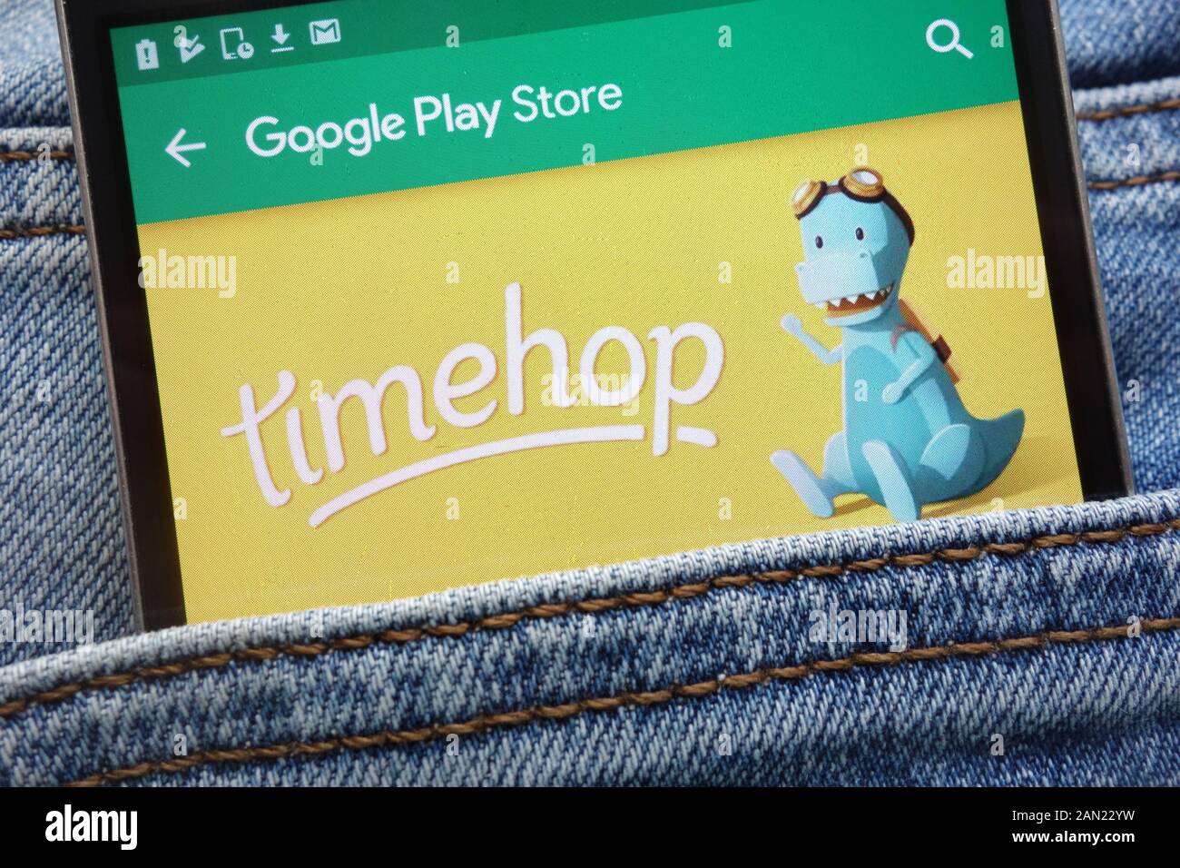 Timehop app on Google Play Store website displayed on smartphone hidden ...