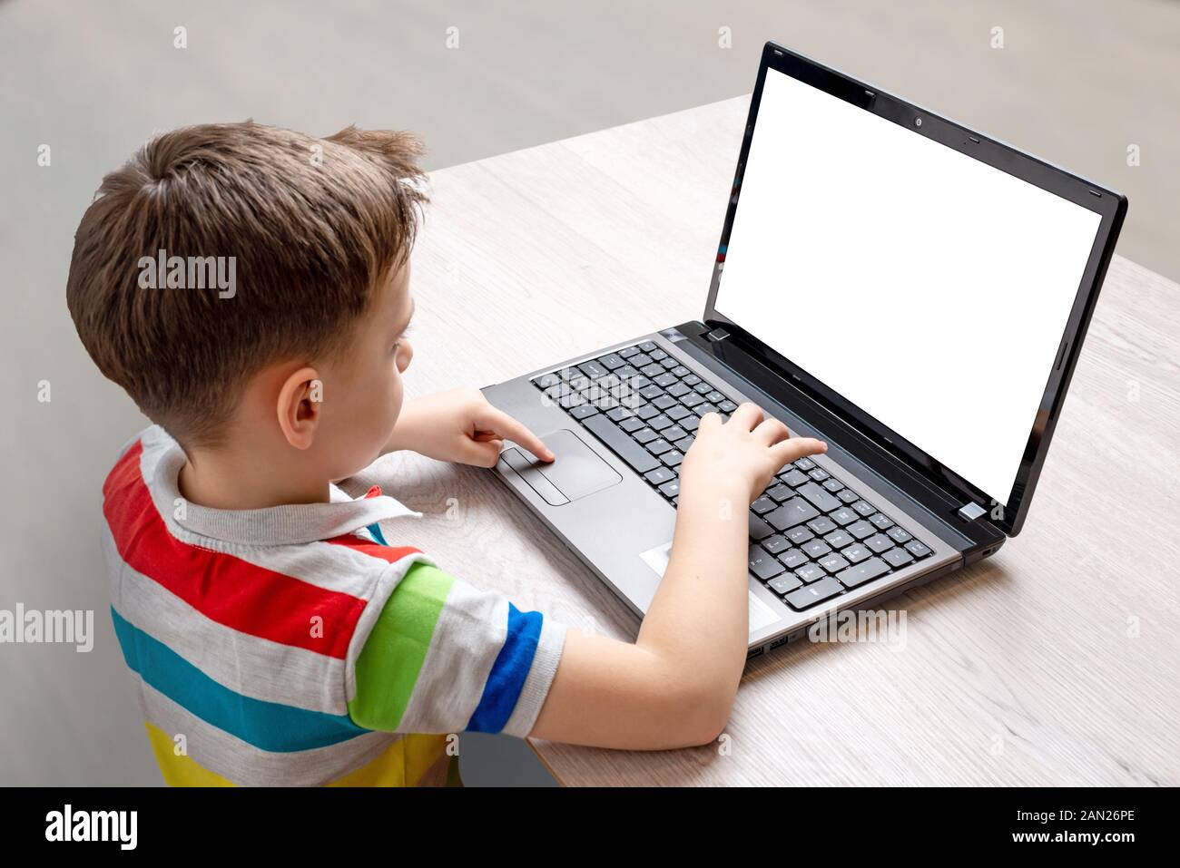Boy use a laptop computer mockup. Isolated screen for app, game or web ...