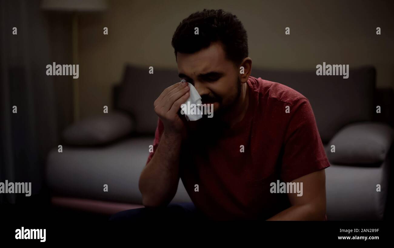 Young man crying tears hi-res stock photography and images - Alamy