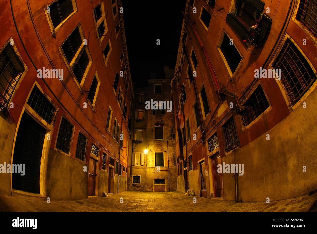 Narrow dead end paving street in old Italian town Stock Photo - Alamy
