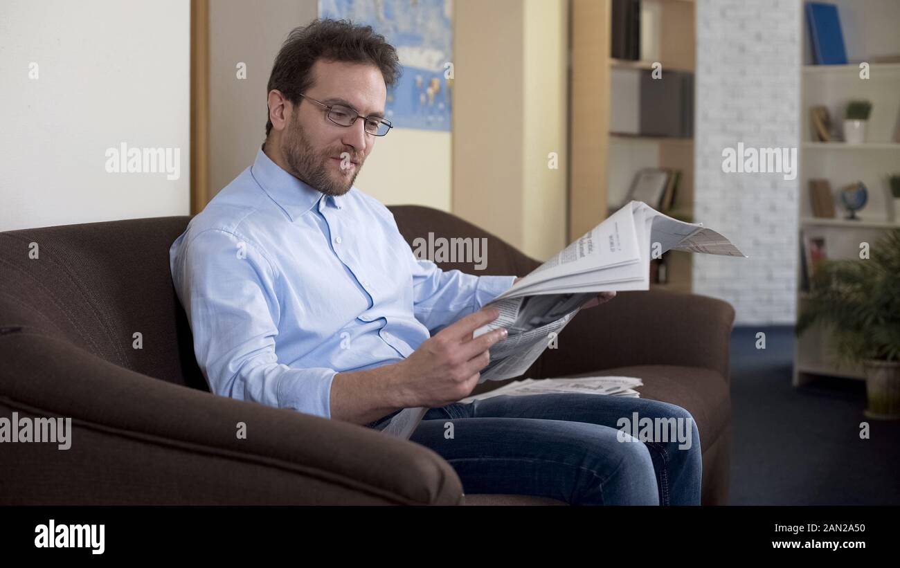 Adult male reading article in newspaper, freedom of speech, information ...