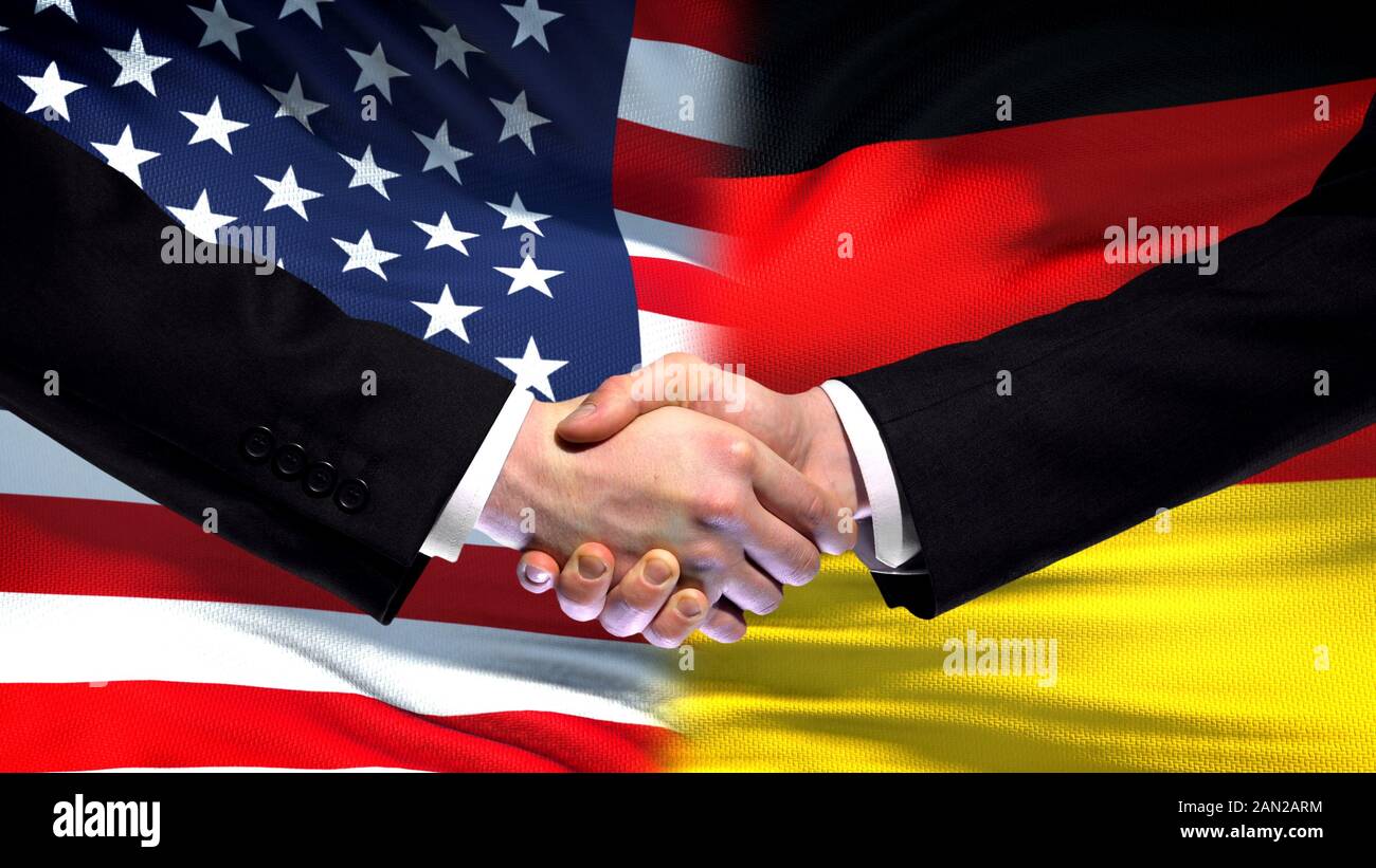United States and Germany handshake, international friendship, flag ...