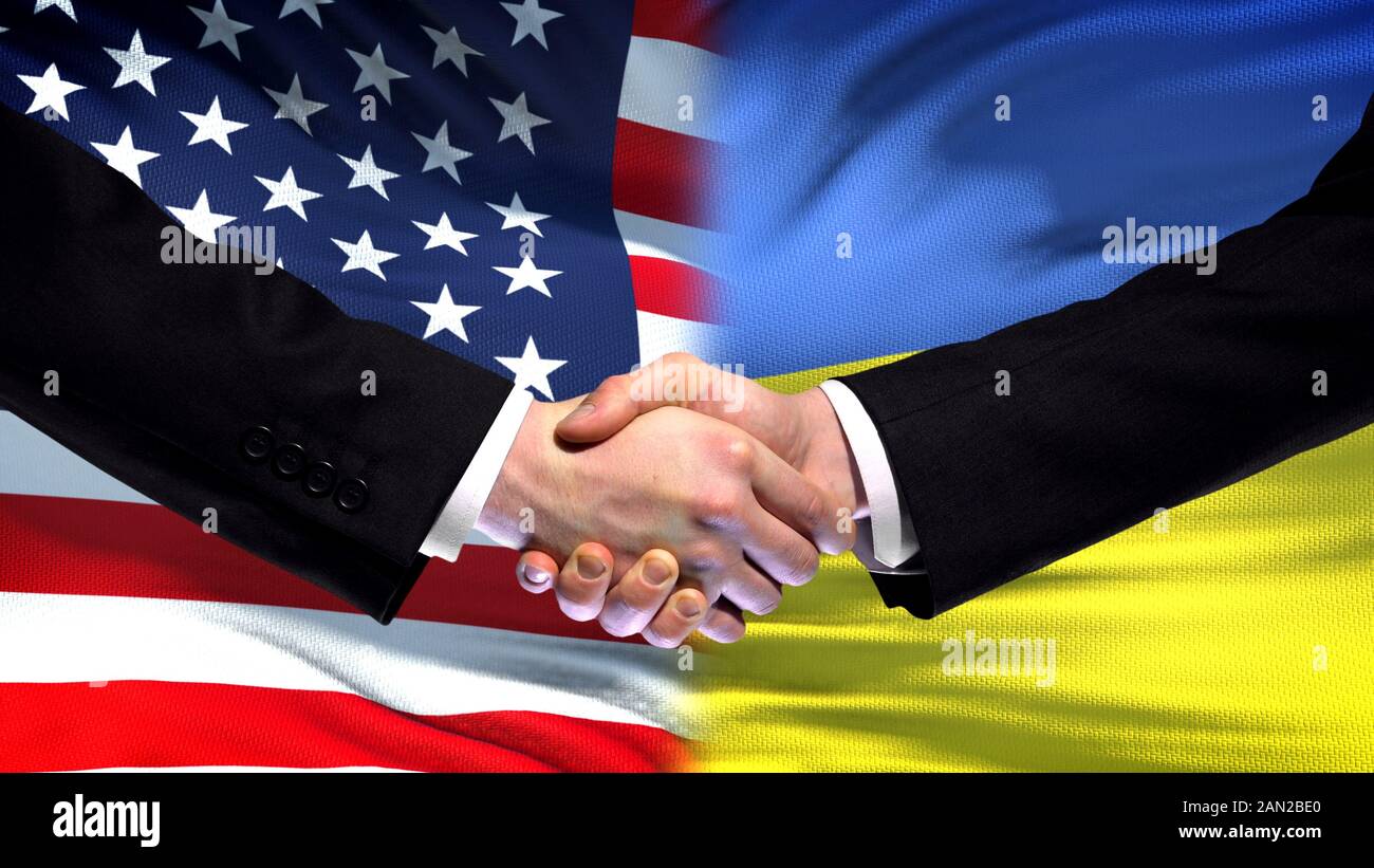 United States and Ukraine handshake, international friendship, flag ...