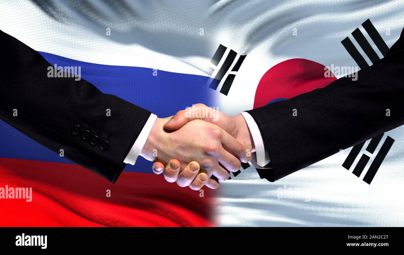Russia and South Korea handshake, international friendship, flag ...