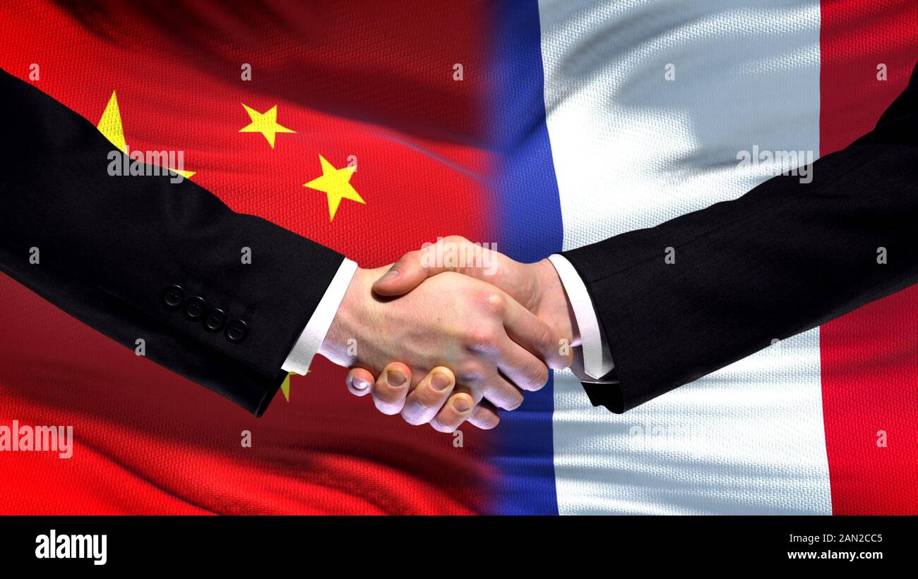 China and France handshake, international friendship relations, flag ...