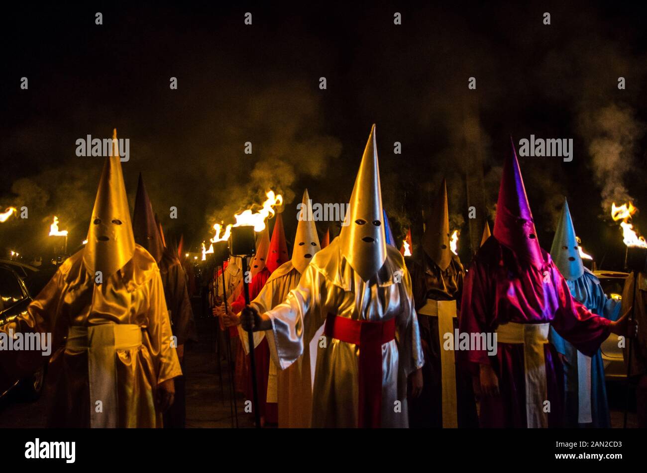 Hooded people make the traditional Fogaréu Procession through the ...